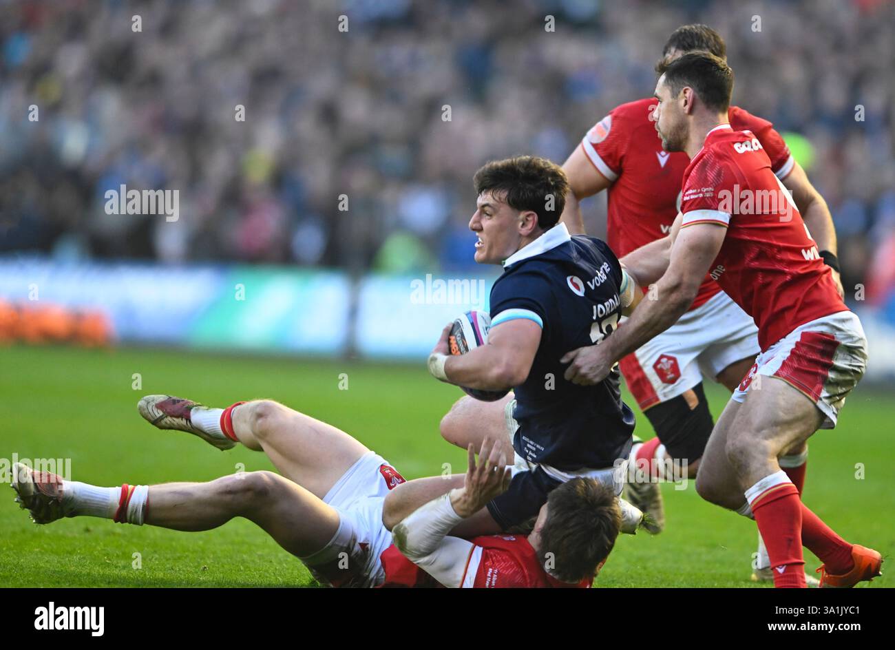 Edinburgh, Scotland, 8th March 2025. Ellis Mee of Wales, Tom Jordan of ...