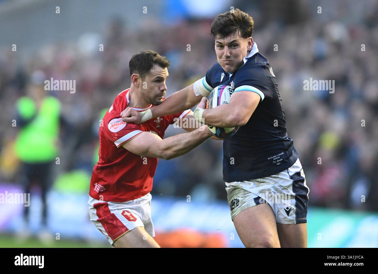 Edinburgh, Scotland, 8th March 2025. Tomos Williams of Wales and Tom ...