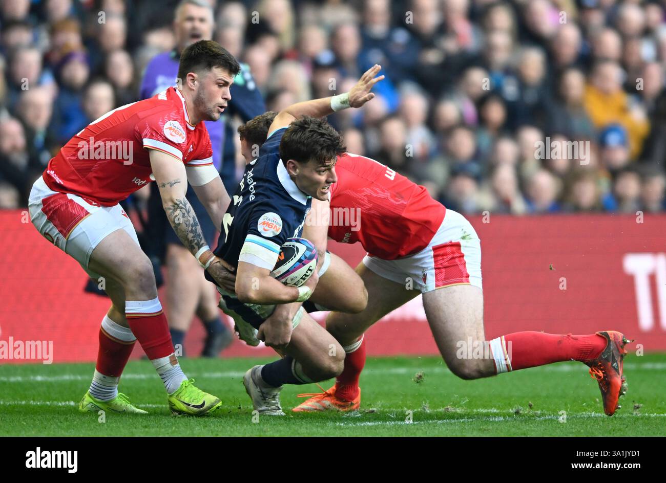Edinburgh, UK. 8th Mar, 2025. Tom Rogers of Wales, Tom Jordan of ...