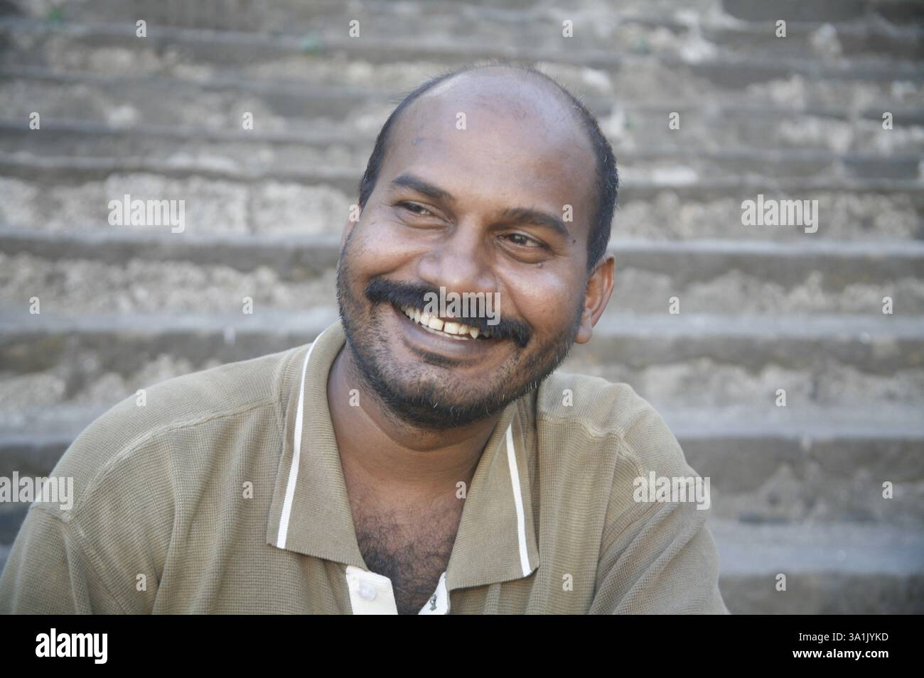 Man smiling, Baanganga old heritage site, Malabar hill, Mumbai Bombay ...