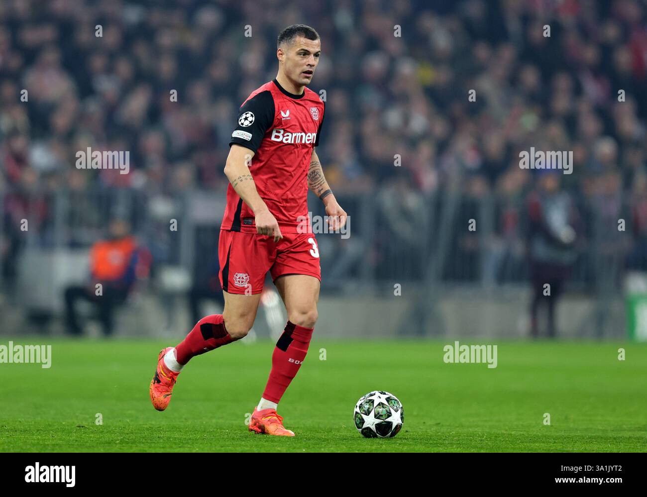 MUNICH, GERMANY - MARCH 05: Granit Xhaka of Bayer Leverkusen runs withe ...