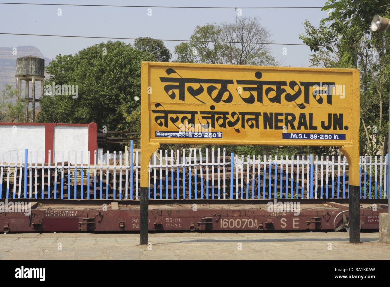 Sign board on platform, Neral Railway Station, Bombay Mumbai ...