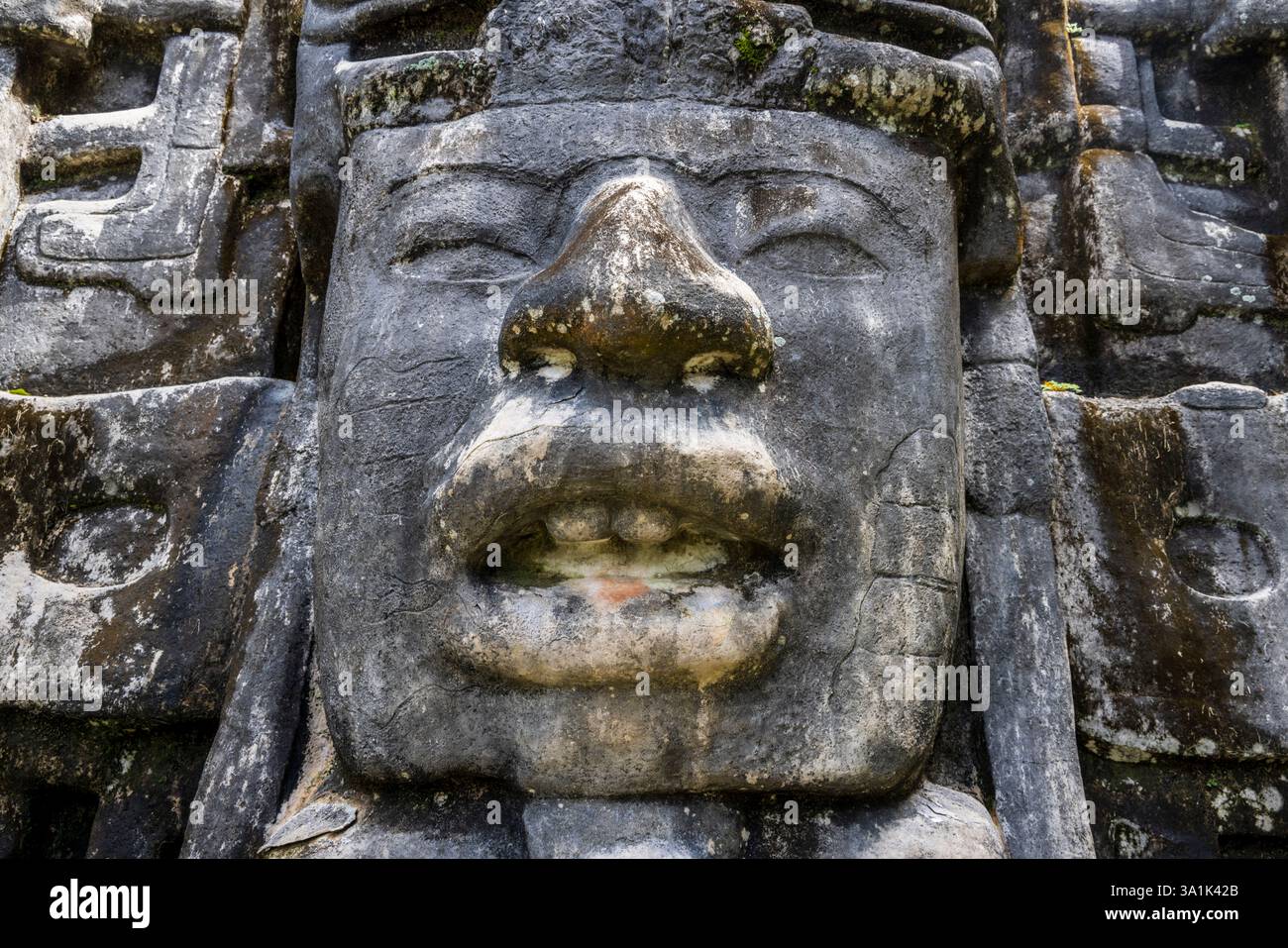 The Temple of the Mask at jungle ruins of the Lamanai Mayan ...