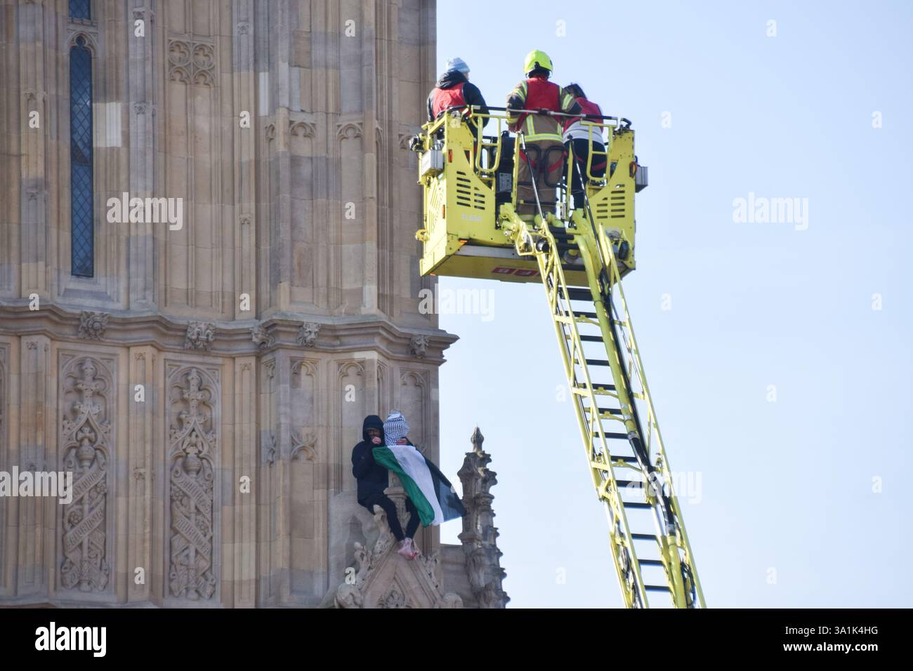 London, UK. 8th March 2025. Police officers speak to the man with a ...