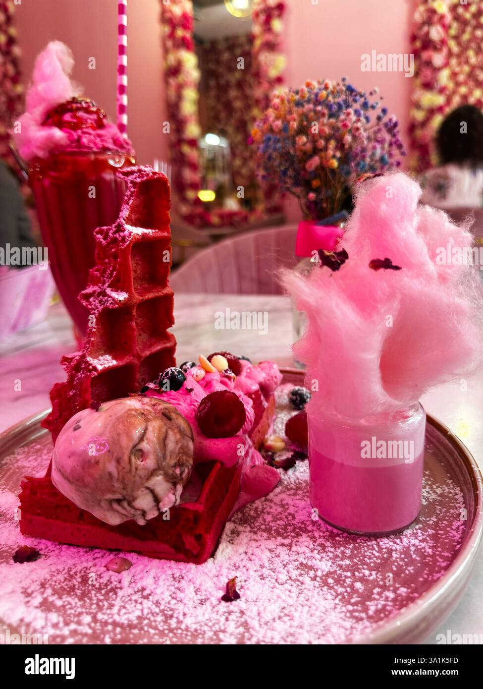 Luxurious Pink Dessert Platter in Floral Cafe Stock Photo - Alamy
