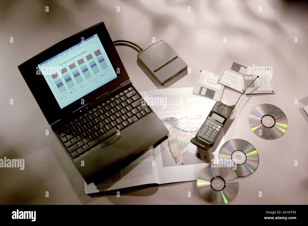 Communication laptop computer, disks, mobile phone, cd's floppies with ...