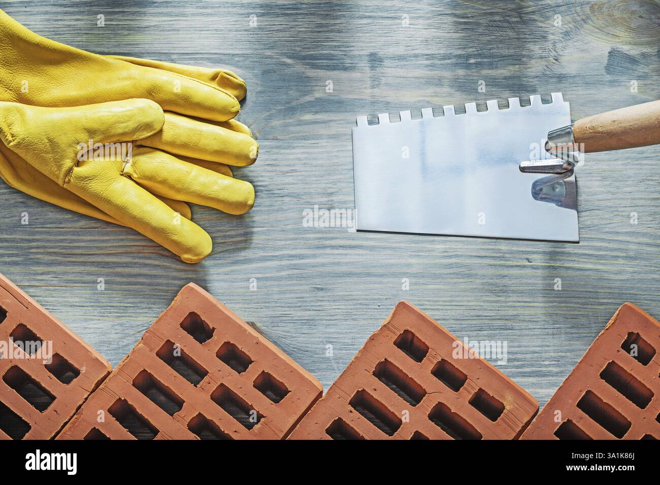Red bricks safety gloves bricklaying trowel building concept Stock ...