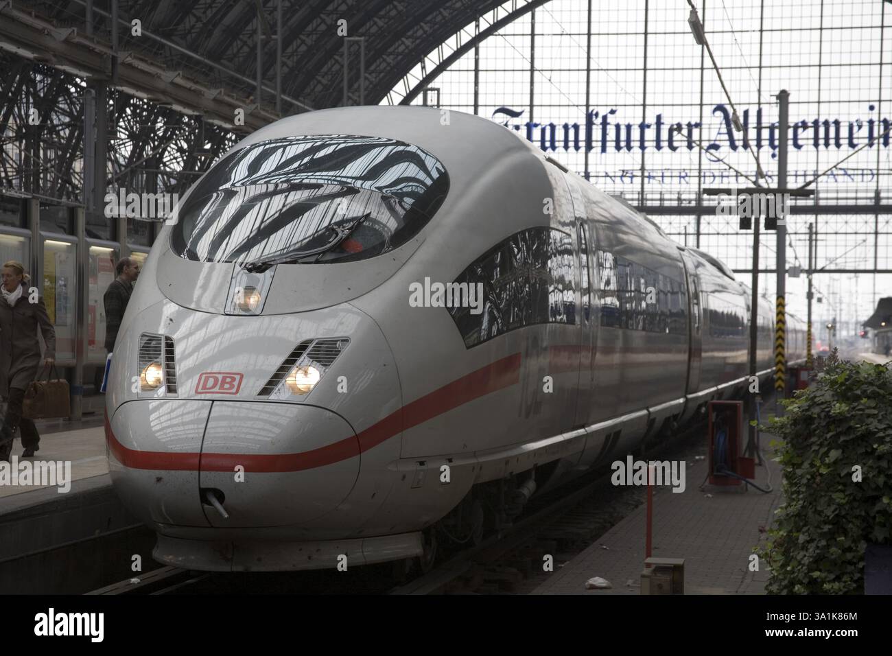 White color German railway engine, DB Hauptbahnhof main railway station ...