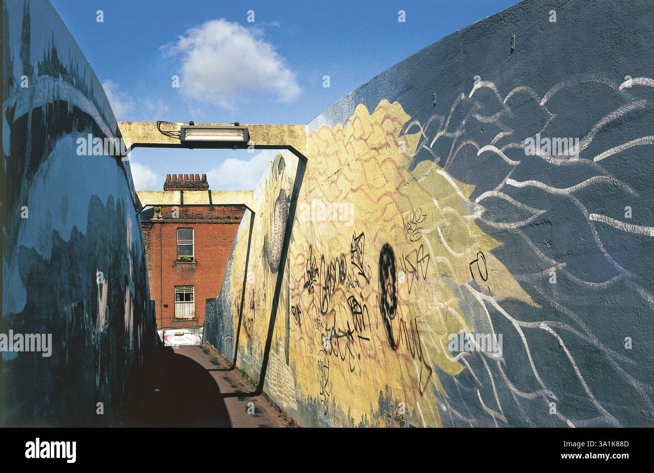 Graffiti explodes into many petal flower on wall of over-bridge, London ...