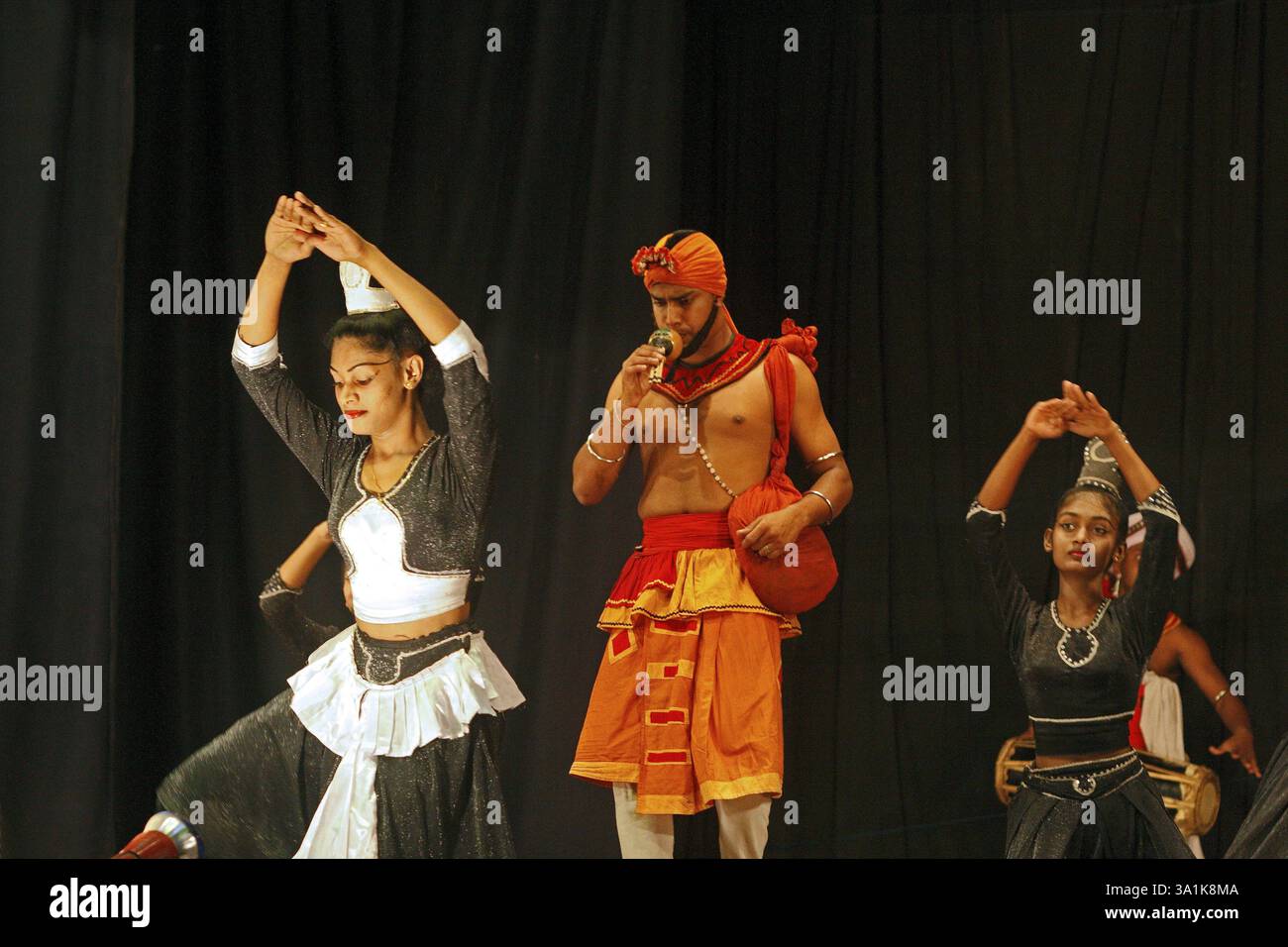 Cobra dance, depicts the movements of the cobra and the taming of it by ...