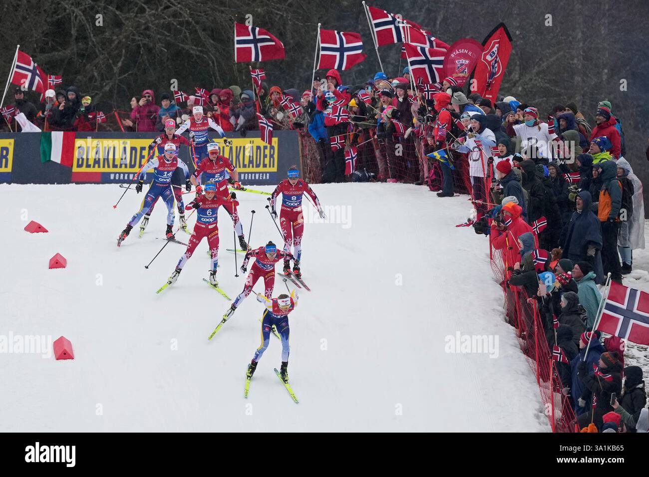 Frida Karlsson, of Sweden, skis ahead of Heidi Weng, Therese Johaug ...