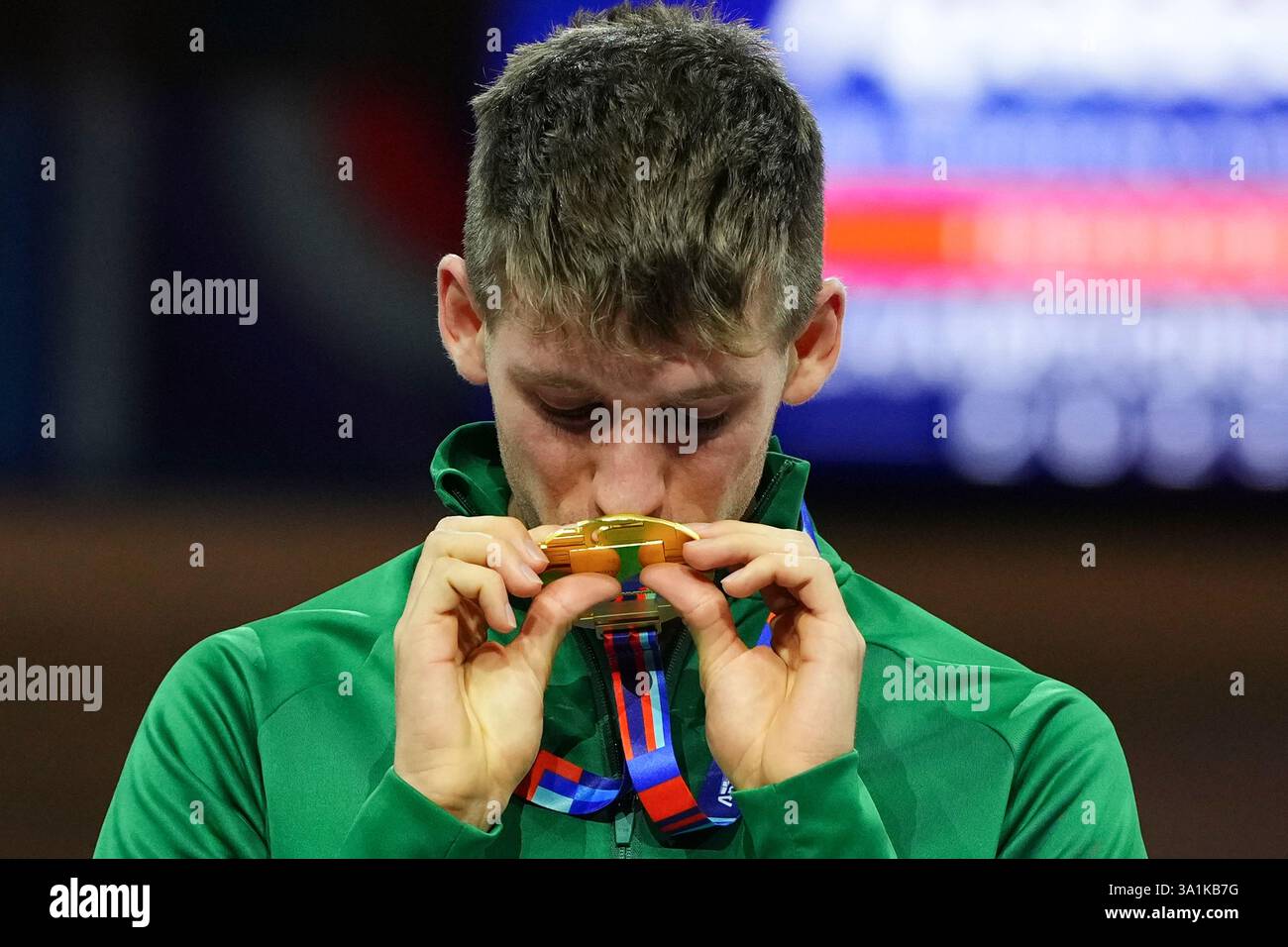 Attila Molnar of Hungary celebrates with his gold medal on the podium ...