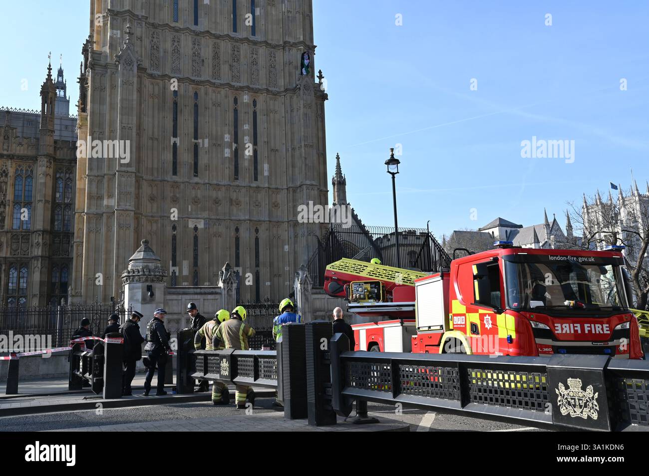 London, UK. 8 March 2025. Pro Palestine man climb on the Big Ben tower ...