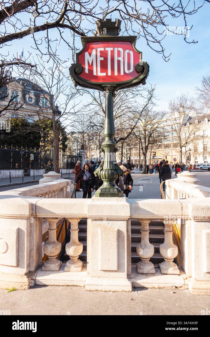 French Paris vintage Metro sign, entrance to Metro station with people ...