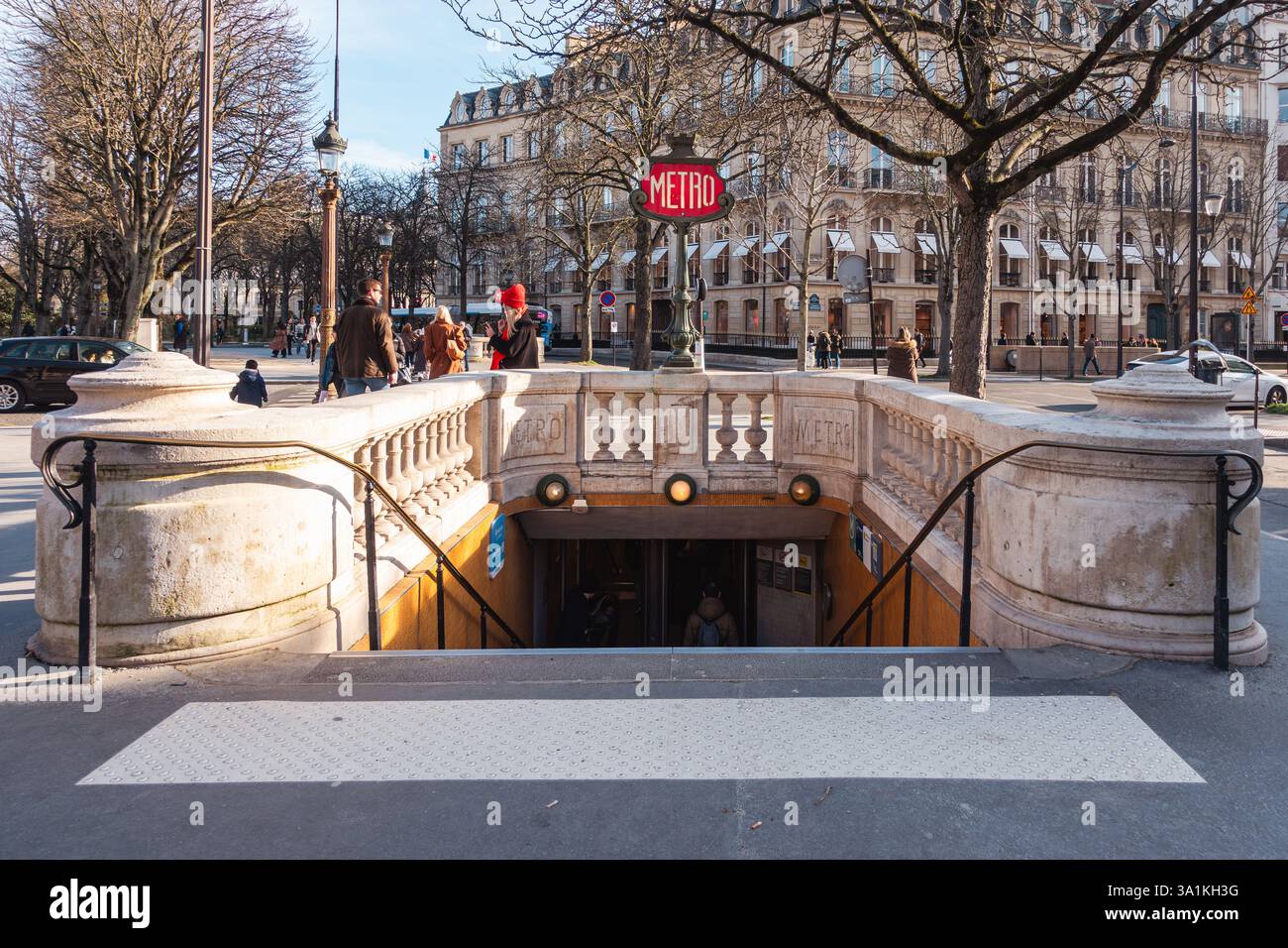 French Paris Metro entrance with vintage sign with people Stock Photo ...