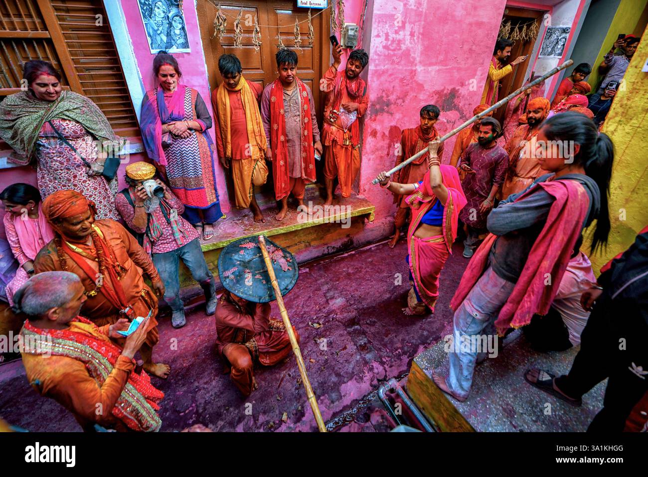 Hindu men are ritually beaten with sticks (Lathi) during the Lathmar ...