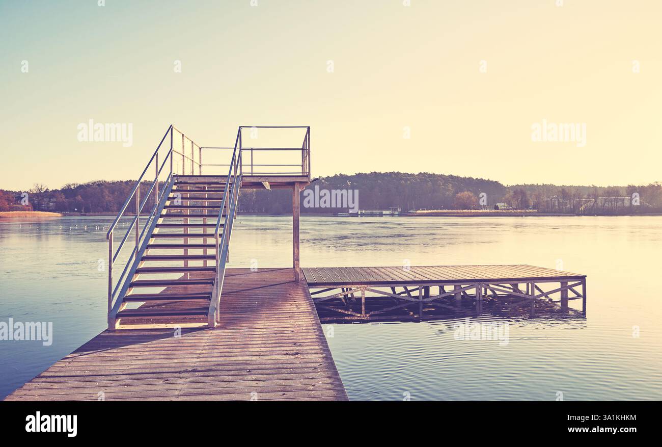 A pier on Barlinek Lake, color toning applied, Poland Stock Photo - Alamy