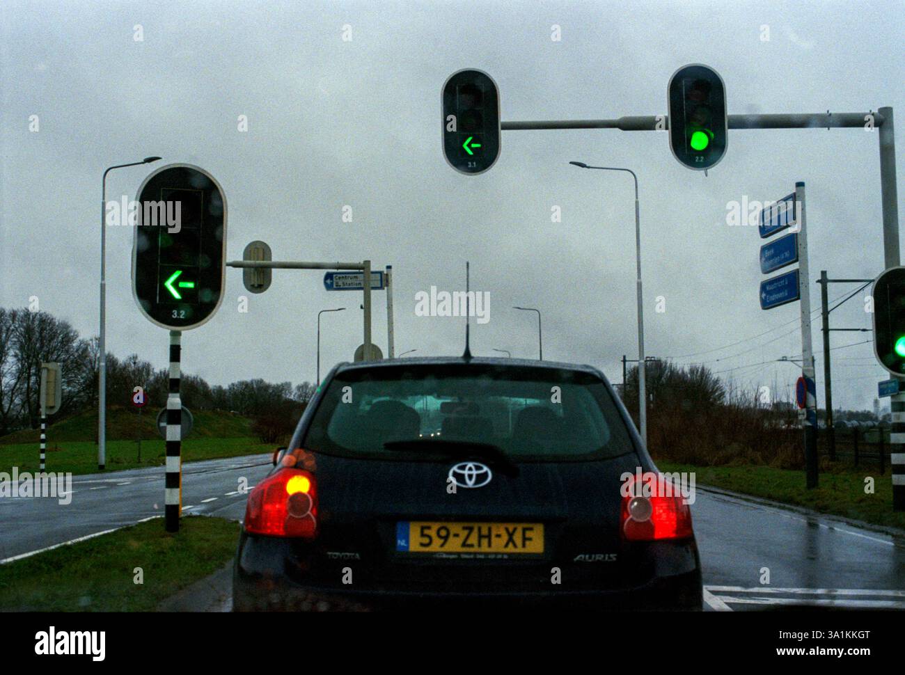 Traffic Lights Toyota Car Stopped before a Green Traffic Light during a ...