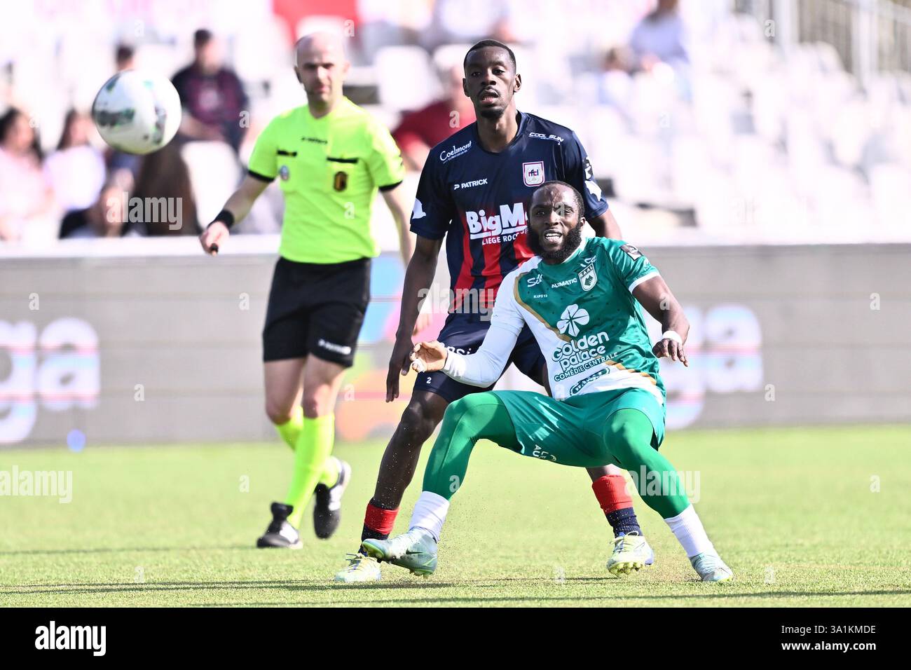 RAAL's Sekou Sidibe and Liege's Jeremie Lioka Lima fight for the ball ...