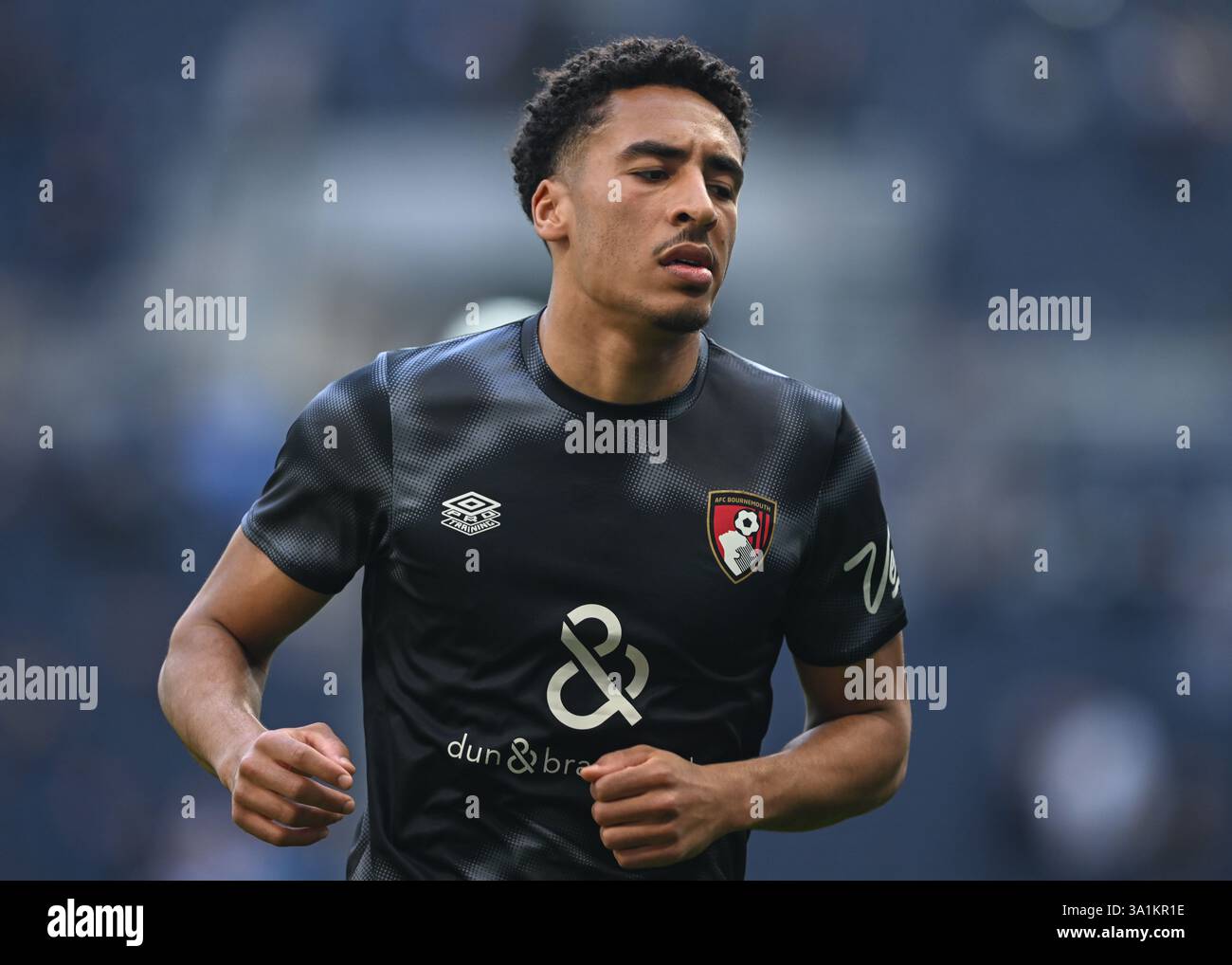 London, UK. 9th Mar, 2025. Tyler Adams of Bournemouth warms up ahead of ...