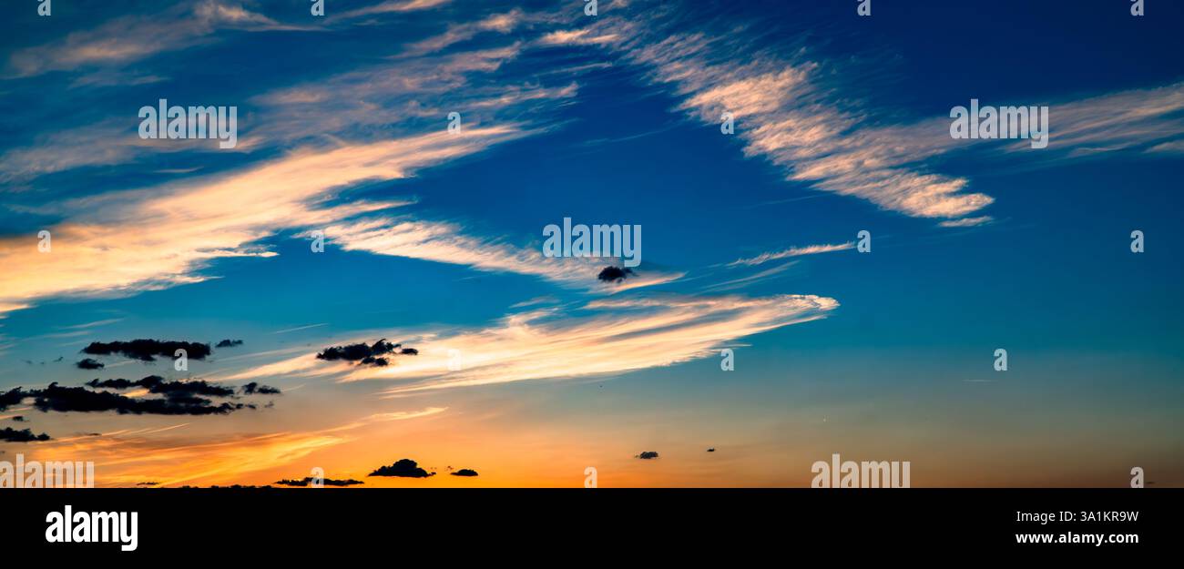 Sunset sky. Cirrocumulus and cirrostratus clouds during sunset ...