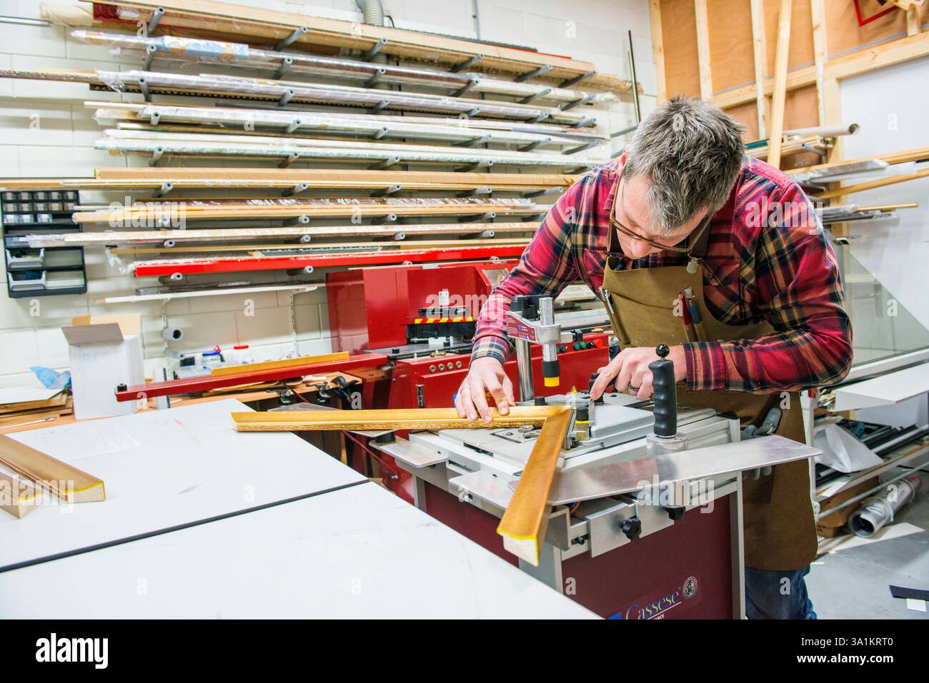 Framemaker inside his workshop Goirle, Netherlands. Mid adult male ...