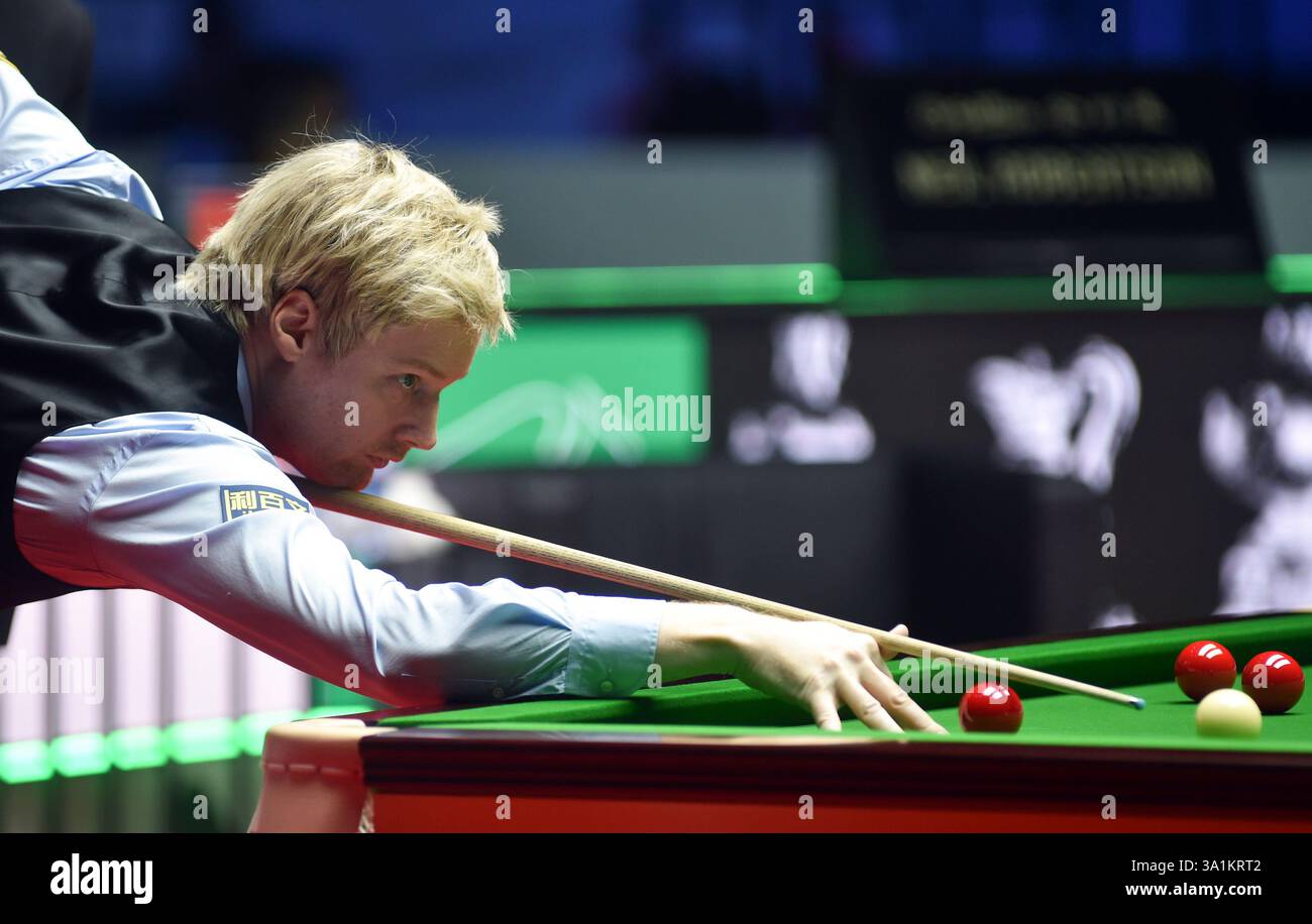 Hong Kong, China. 9th Mar, 2025. Neil Robertson plays a shot during the ...