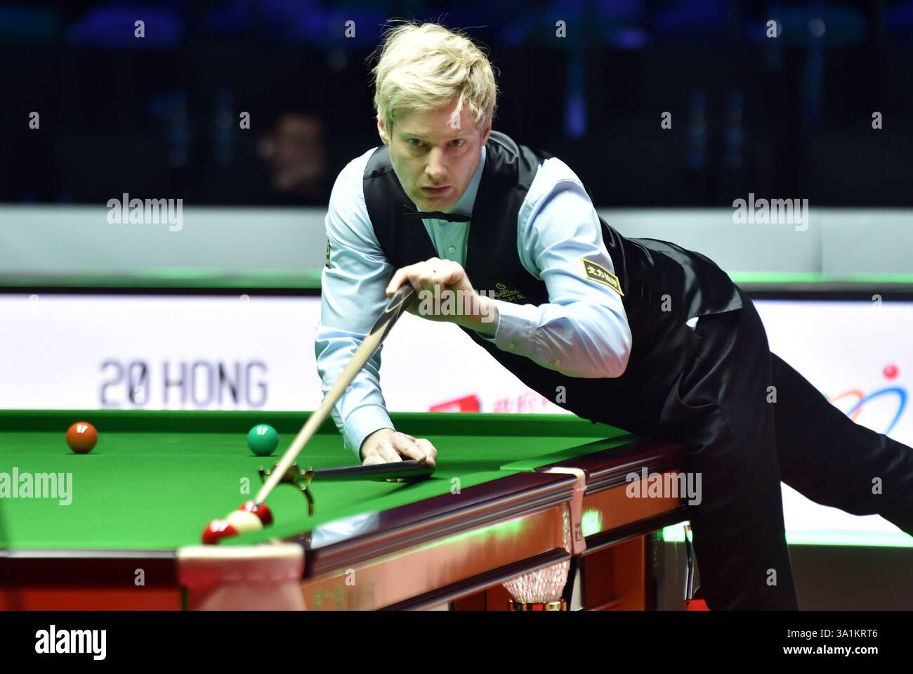 Hong Kong, China. 9th Mar, 2025. Neil Robertson plays a shot during the ...