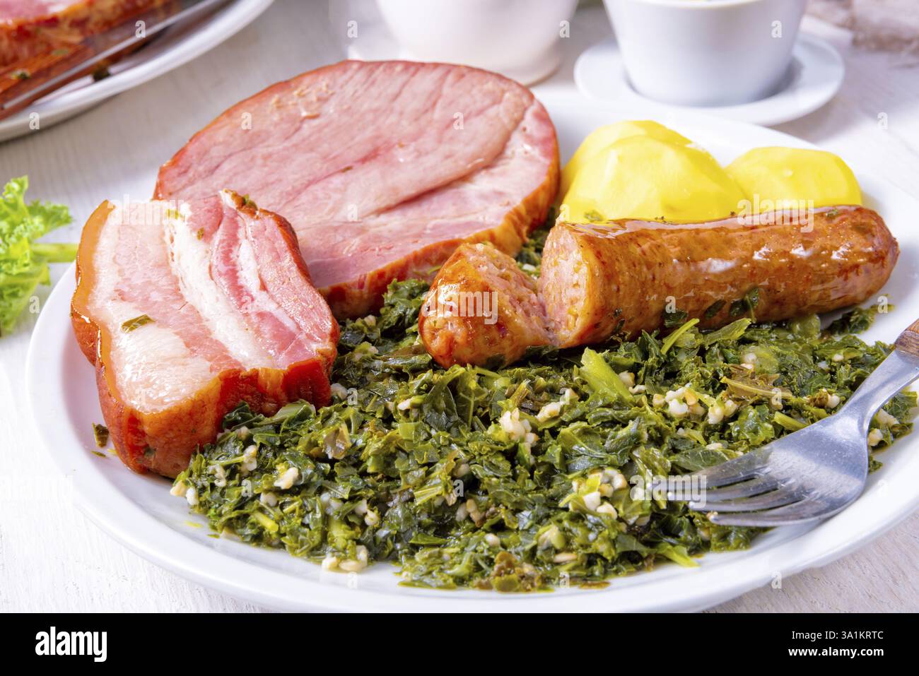 A delicious genuine oldenburger kale with peeked pinkel sausage Stock ...