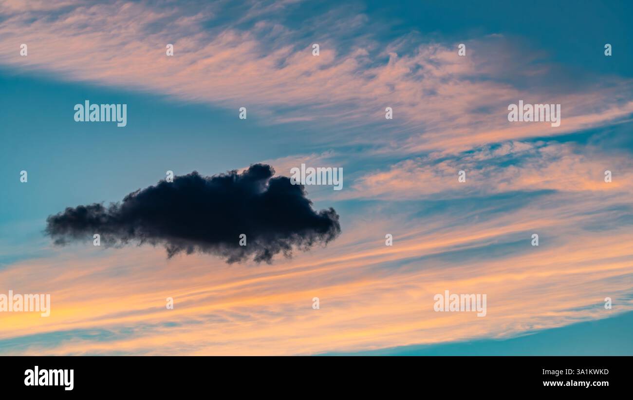 Sunset sky. Cirrocumulus and cirrostratus clouds during sunset. Beautiful dramatic sunset sky ...
