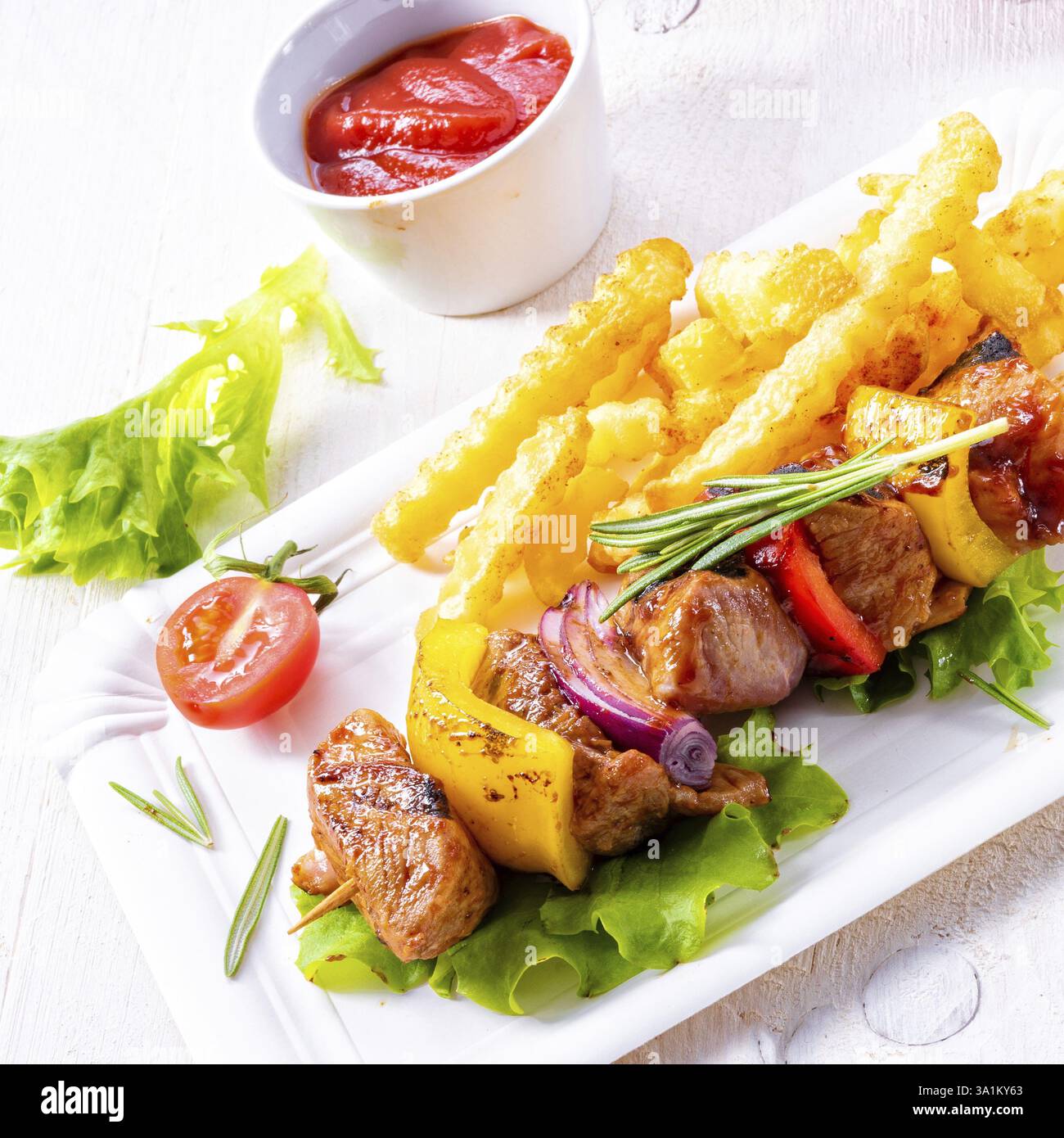 Shish kebab skewers with marinated ham meat paprika and red onion Stock ...