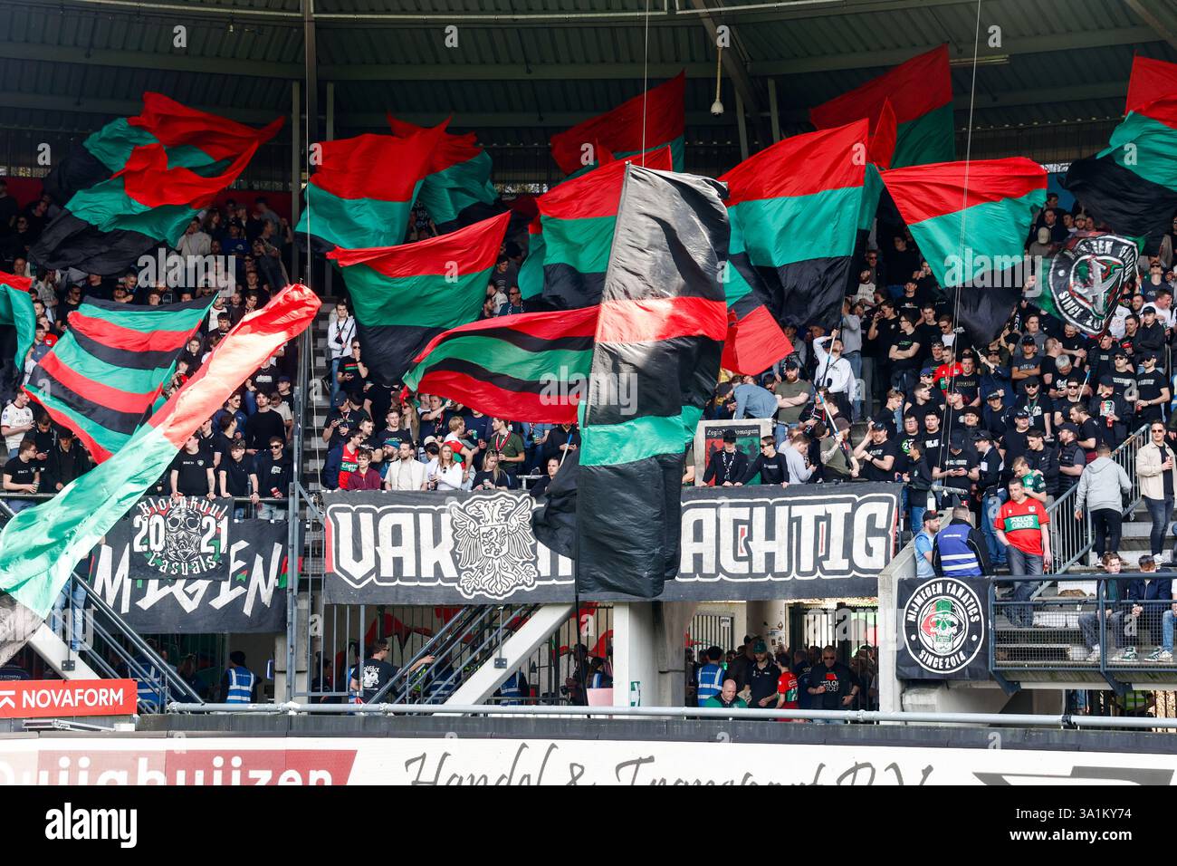 NIJMEGEN, NETHERLANDS - MARCH 9: Fans of NEC waving with flags prior to ...
