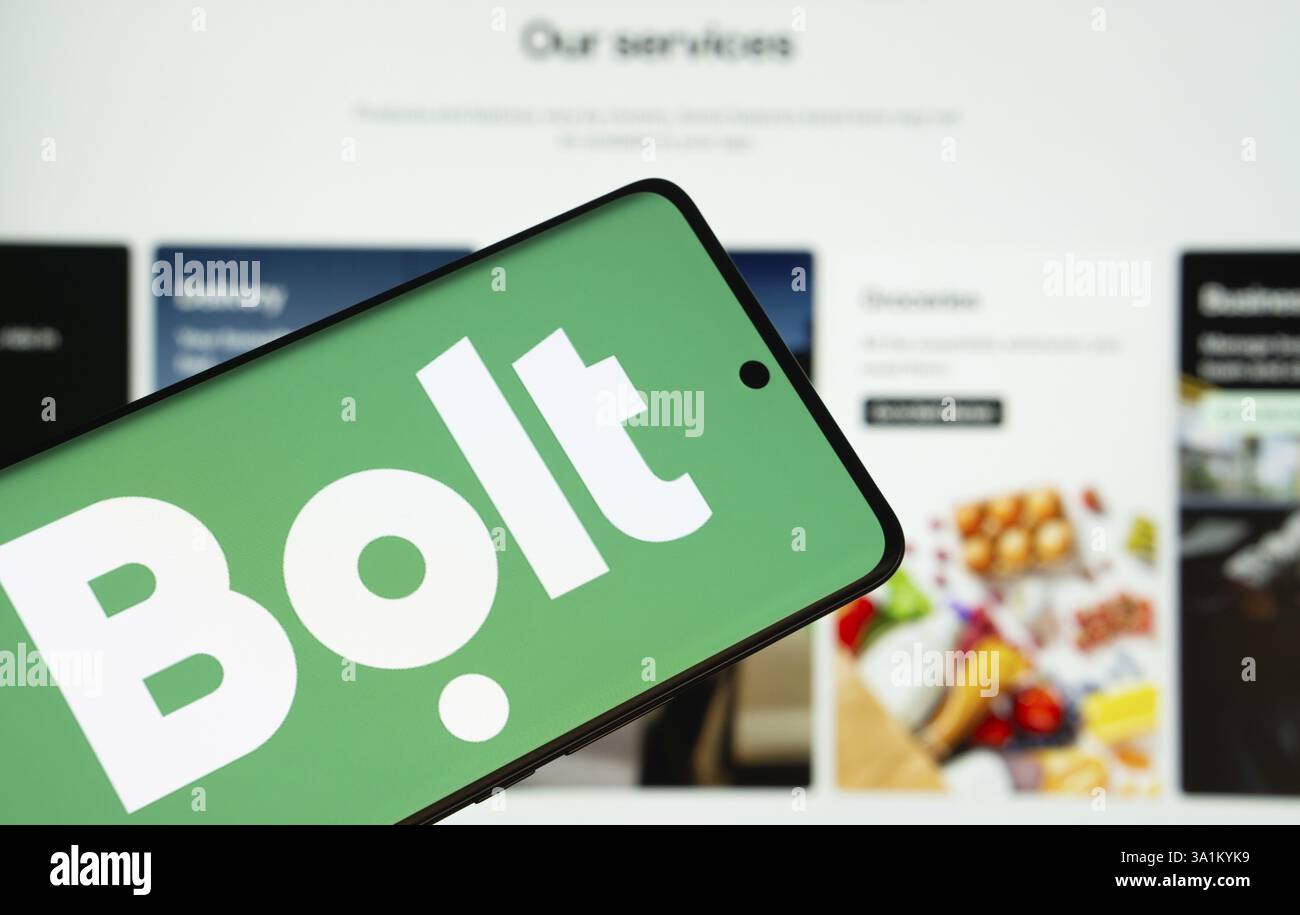 Bolt logo is displayed on a smartphone screen, with the bolt website ...