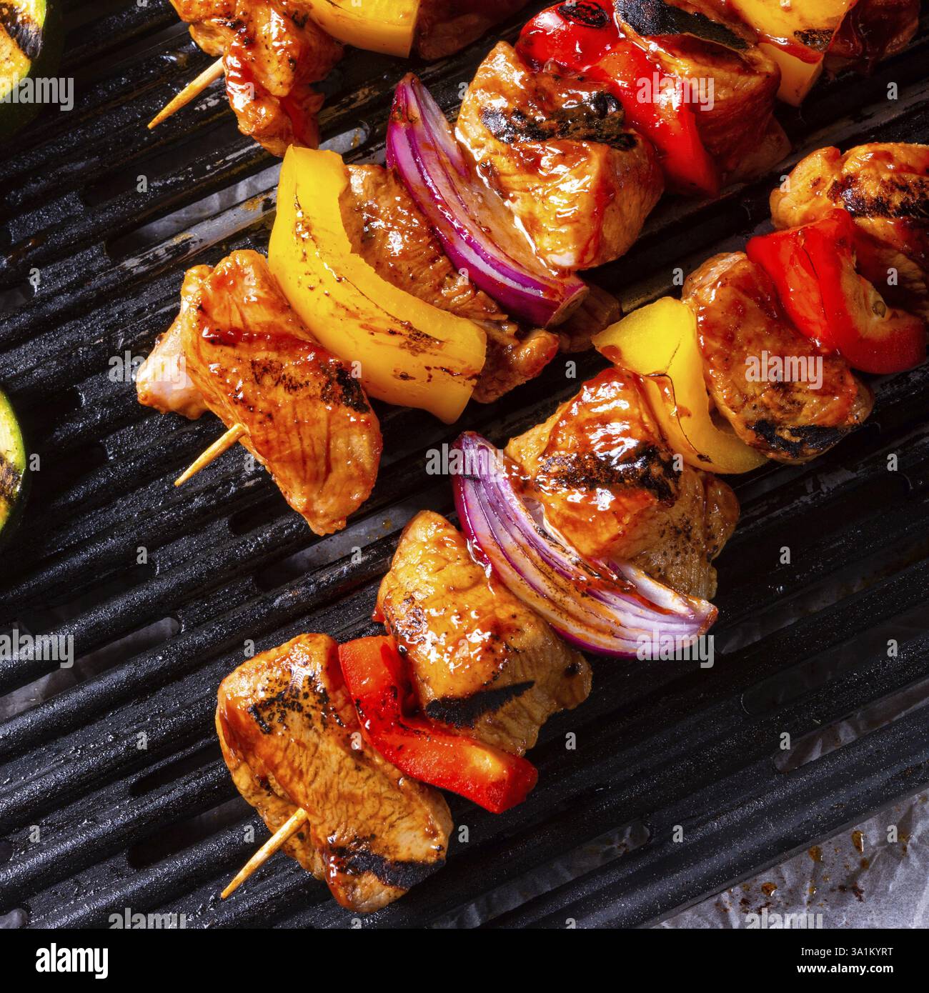 Rustic shish kebab skewers with marinated ham meat paprika and red ...
