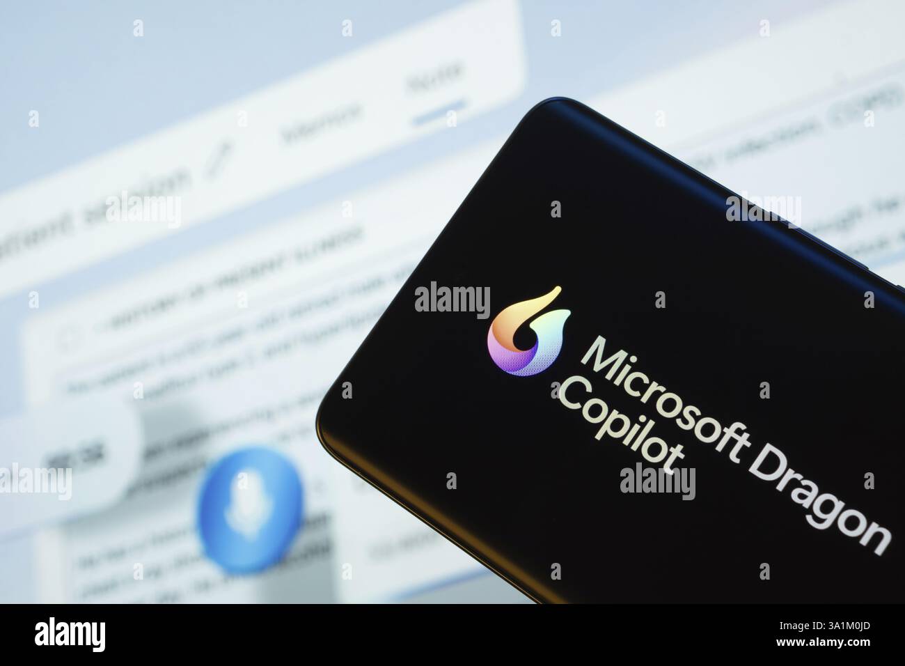 Microsoft dragon copilot logo is displayed on a smartphone screen, with the microsoft dragon ...