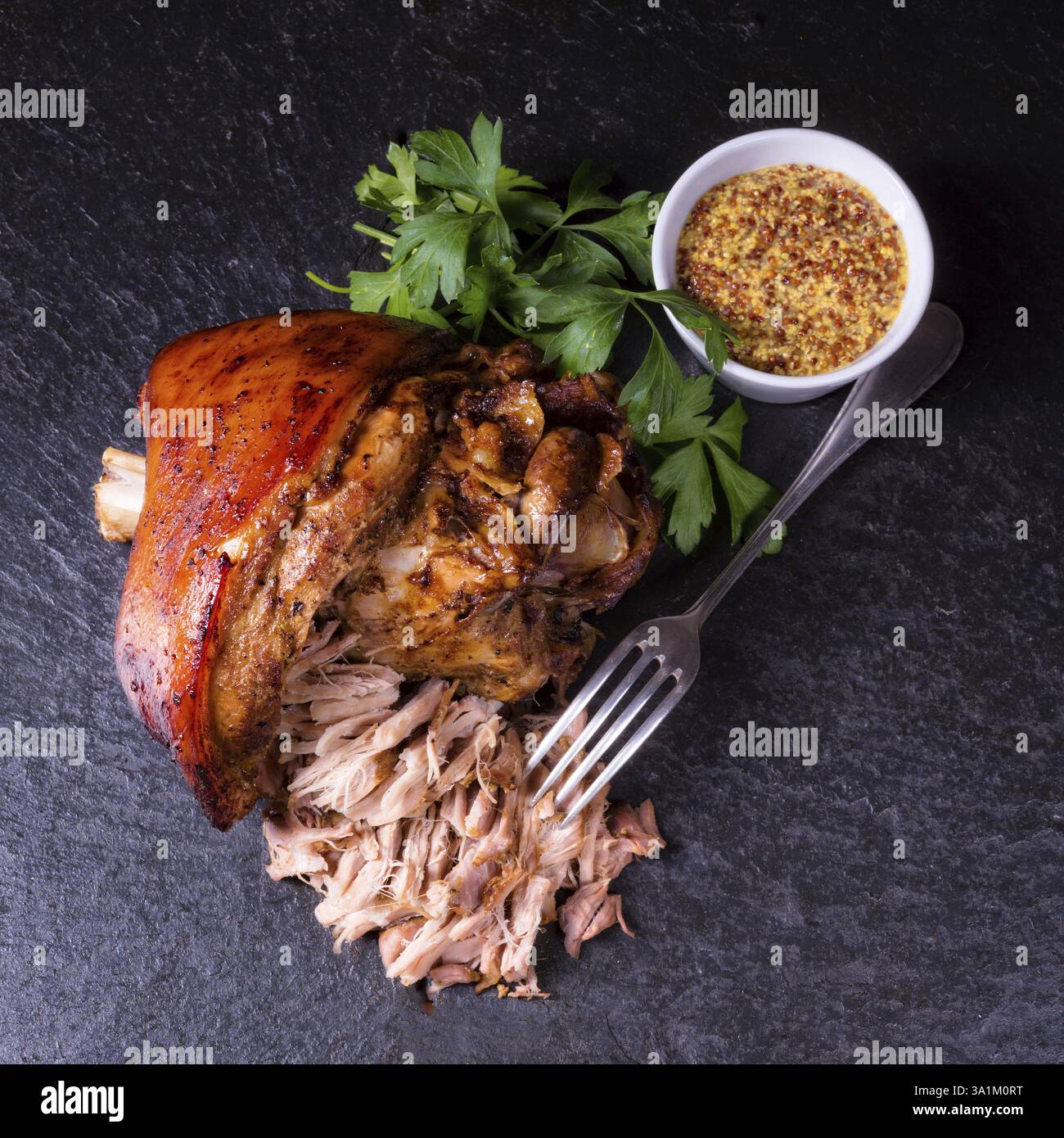 Crispy fried Bavarian pork knuckle with soft meat Stock Photo - Alamy