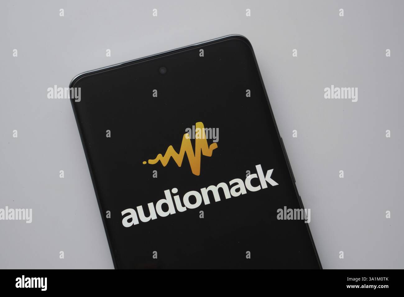 Audiomack logo is seen on a smartphone Stock Photo - Alamy