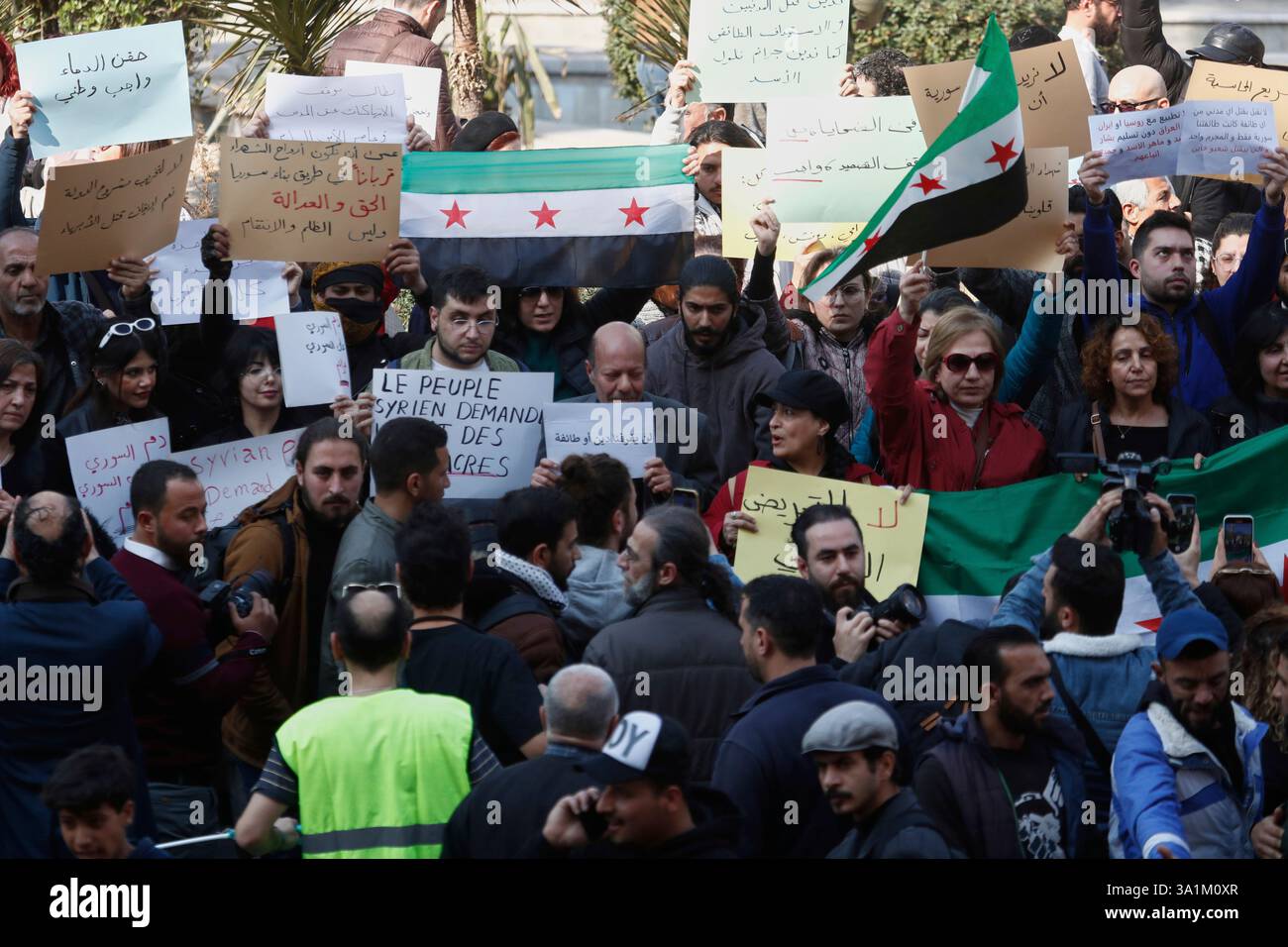 Activists protest against the recent wave of violence and sectarian ...