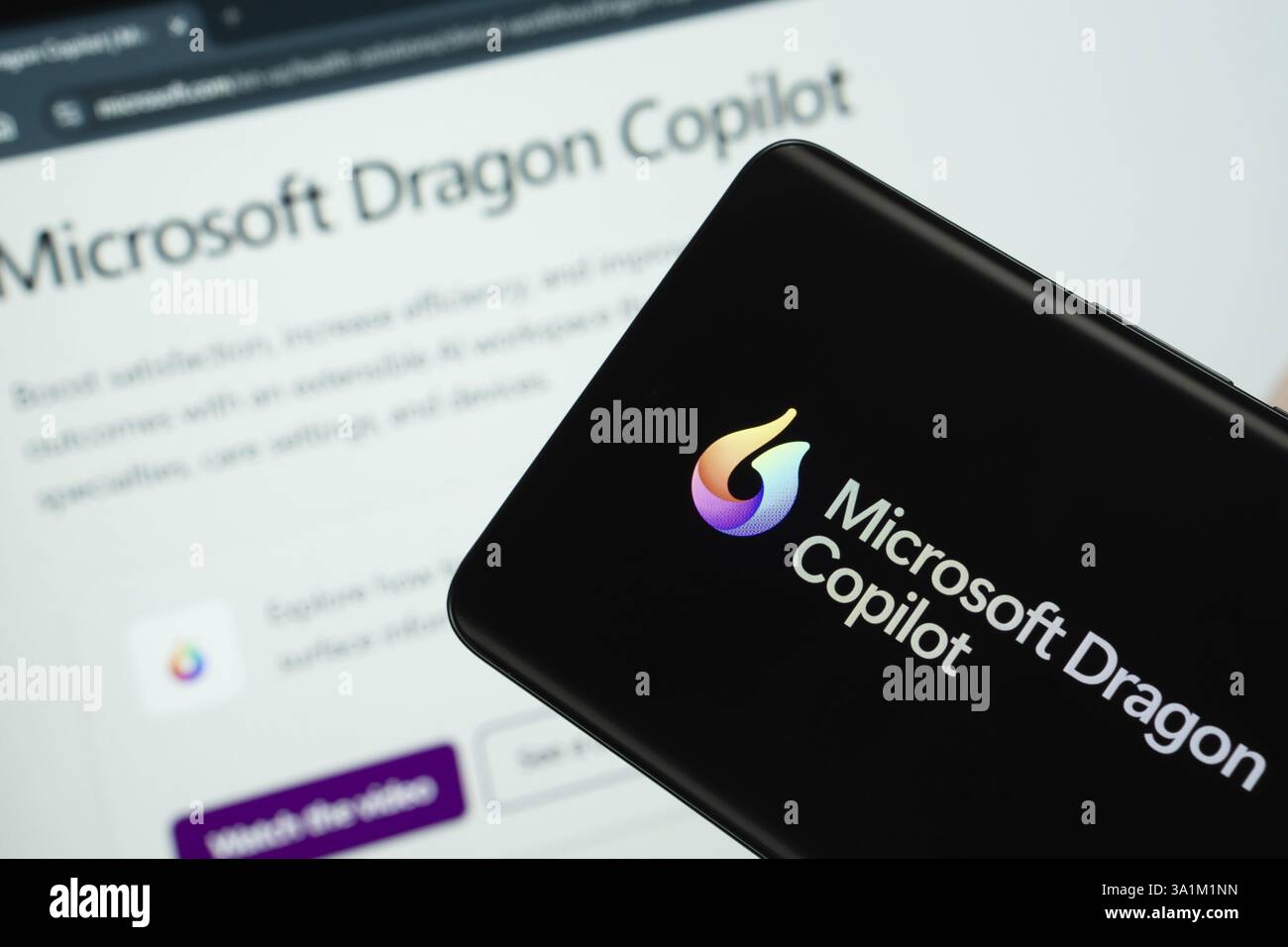 Microsoft dragon copilot logo is displayed on a smartphone screen, with the microsoft dragon ...