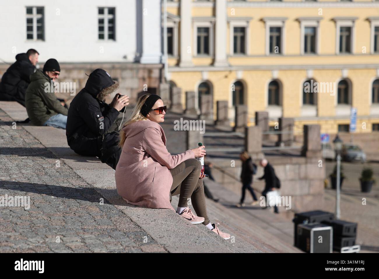 March 8, 2025, Helsinki, Uusimaa, Finland: People enjoy warm weather on ...