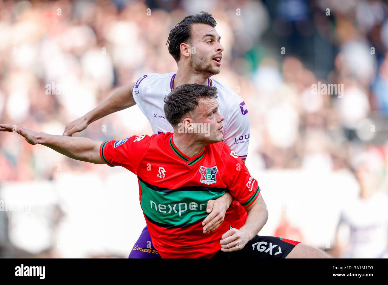 NIJMEGEN, NETHERLANDS - MARCH 9: Vito van Crooij of NEC and Enric ...
