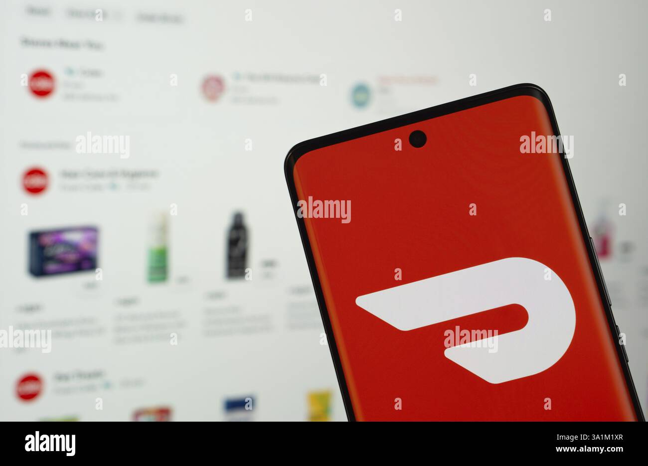 Doordash logo is seen on a smartphone Stock Photo - Alamy