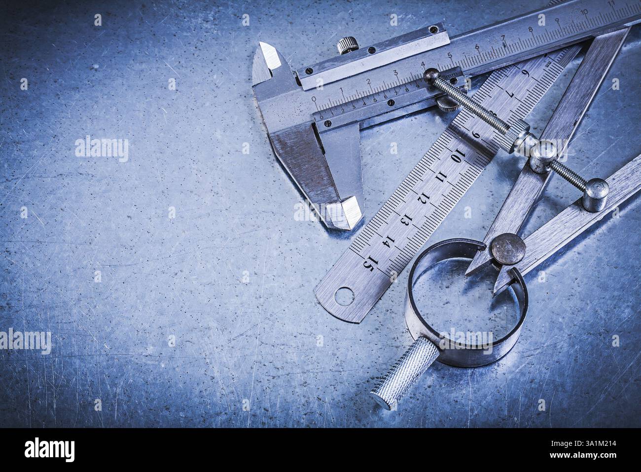 Metal ruler slide caliper construction pair of compasses on metallic ...