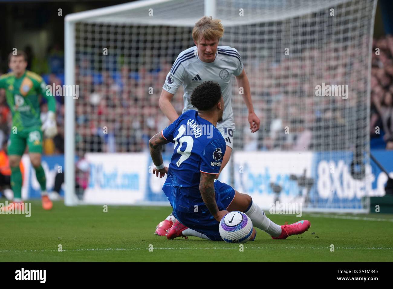 Chelsea's Jadon Sancho is tackled by Leicester's Stephy Mavididi during ...
