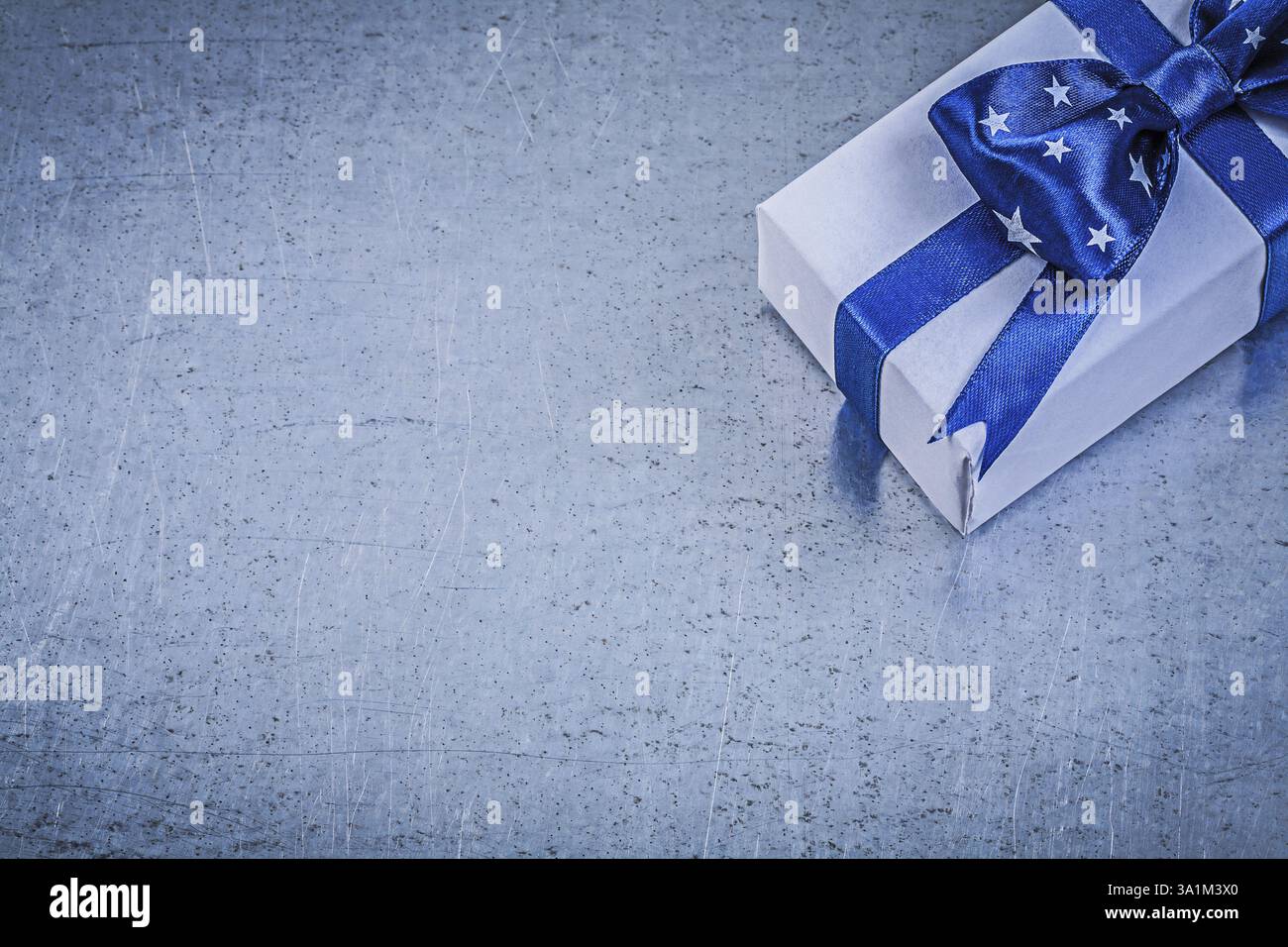 Packed box-container with bow on metallic background celebrations ...