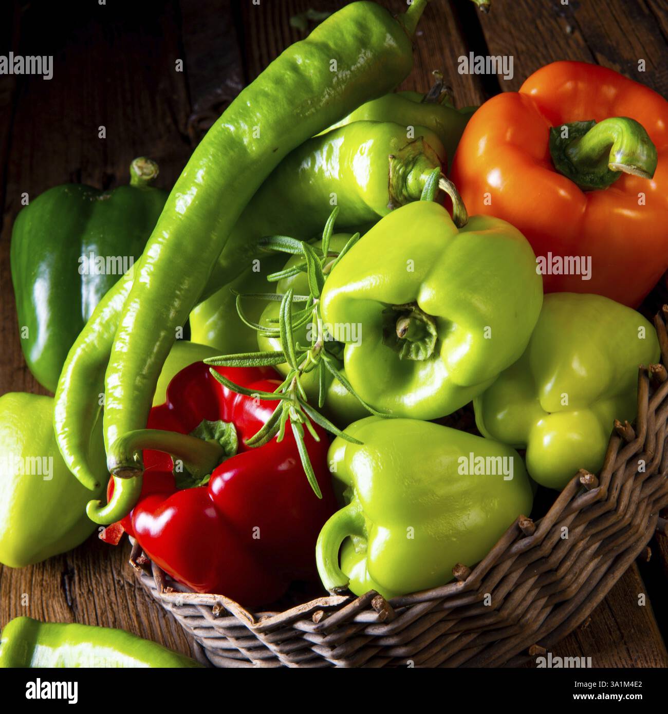 Various harvested peppers and hot peppers in basket Stock Photo - Alamy