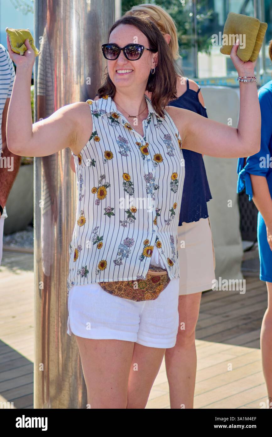 Woman cornhole hi-res stock photography and images - Alamy