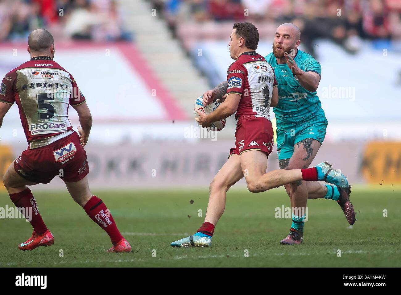 Jake Bibby tackles JAI FIELD *** during the Super League match between ...