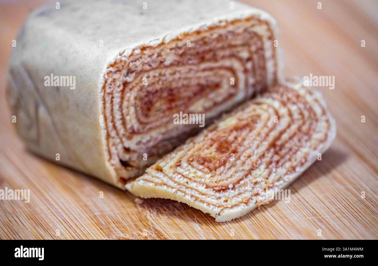 Traditional roll cake also known as Swiss roll, filled with guava paste ...