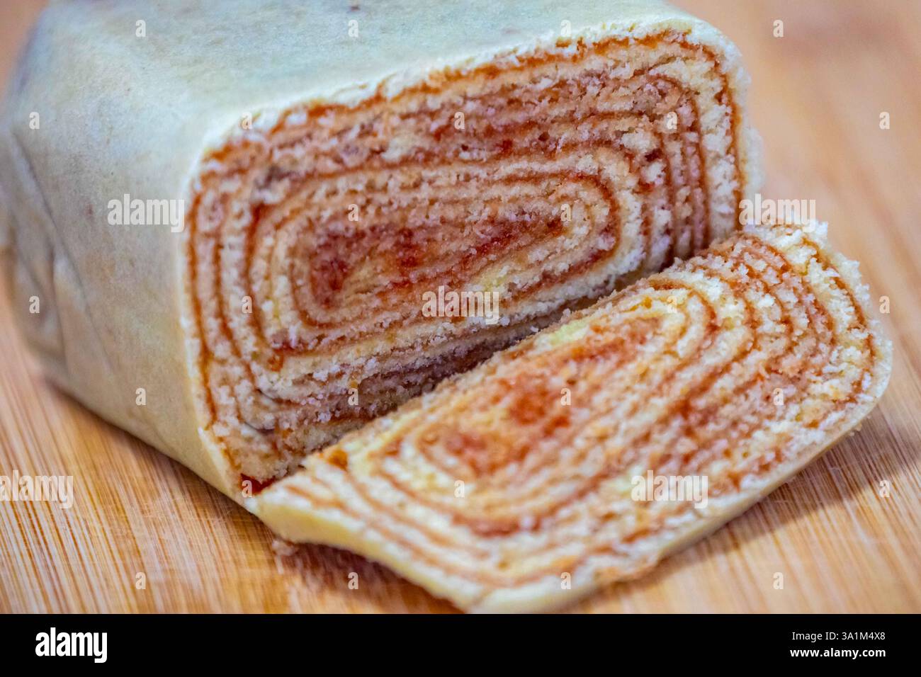 Traditional roll cake also known as Swiss roll, filled with guava paste ...